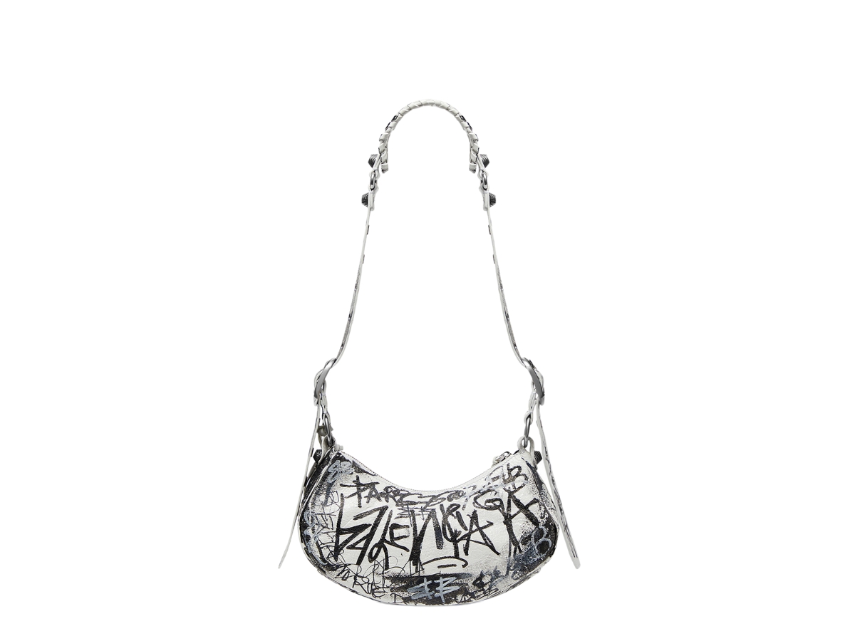 SASOM | กระเป๋า Balenciaga XS Le Cagole Shoulder Bag In Graffiti Printed Arena Lambskin With ...
